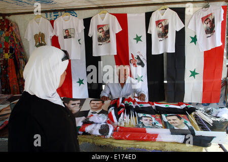 Damascus, Damascus. 25th May, 2014. Photos of Syrian President Bashar ...