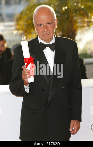 Producer Alain Sarde poses with The Jury Prize awarded to director Jean ...