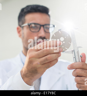 A caliper with an eye Stock Photo - Alamy