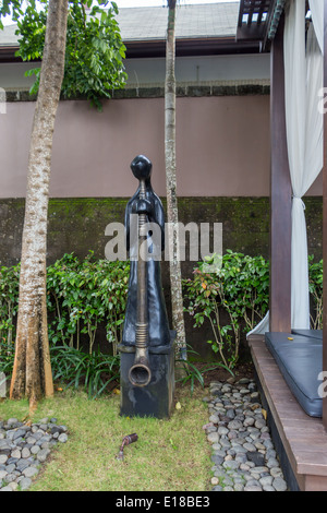 Ornate column in formal Balinese garden Stock Photo - Alamy