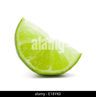 Citrus lime fruit segment isolated on white background cutout Stock Photo - Alamy