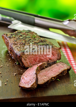 Delicious steak. Beef steak medium rare on vegetable cushion. Beef ...