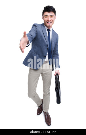 Businessman reaching out for handshake in office, focus on hand Stock ...