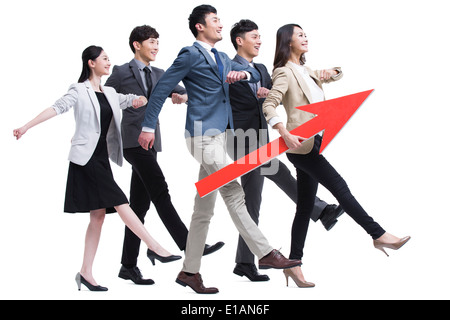 Young businessperson stepping forward with red arrow sign Stock Photo ...