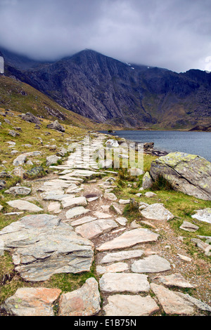 Llyn Idwal with well maintained footpath distant mountain of Pen yr Ole ...