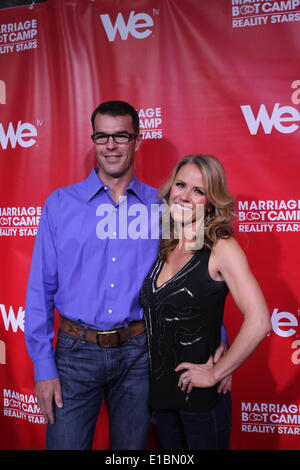 Reality TV stars Ryan and Trista Sutter, bottom, join 20 other couples ...