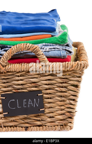 Jeans neatly folded in a pile on a wooden shelf. Flatley. Concept of ...