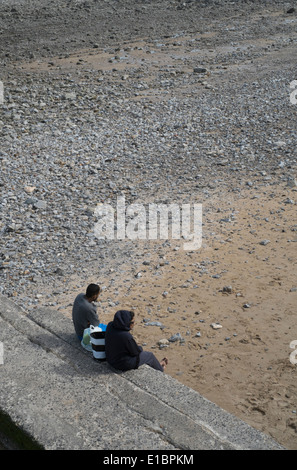 People on the beach at The Mumbles in South Wales Stock Photo - Alamy
