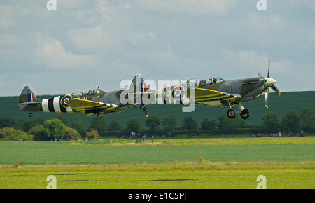 DUXFORD, ENGLAND. A pair of Supermarine Spitfire with the D-Day livery ...