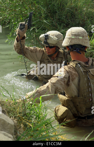 U.S. Marine Corps Cpl. Paul Alfaro, a network administrator with 1st ...