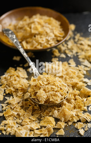 Sea salt in bowl on wood table, shallow focus Stock Photo - Alamy
