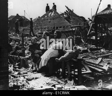 World War 2, Battle of Britain. Homeless children sit outside the ...