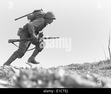 Marine Pfc. Paul E. Ison runs through Japanese machine gun fire on ...