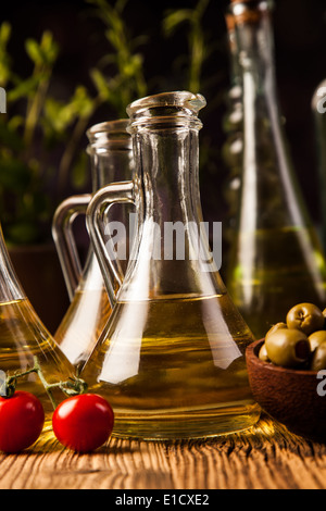 Old Vintage Olive Oil / Vinegar Bottle on Dark Wooden Surface ...