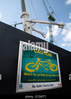 Safety warning sign for HGV drivers about cyclists on London building ...