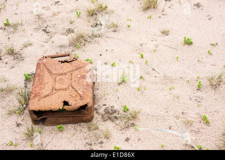 Big old rusty fuel jerrican or cannister at sand Stock Photo - Alamy