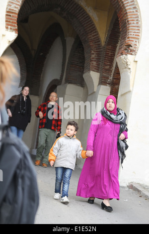 AFRICA MOROCCO TANGIER Berber women in traditional dress selling ...