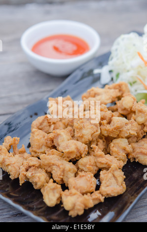 deep fried chicken tendons with fresh vegetable and chili sauce, asian ...