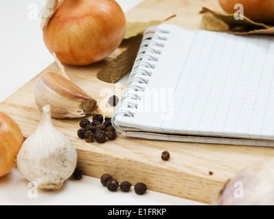 notebook for culinary recipes on a kitchen cutting board Stock Photo ...