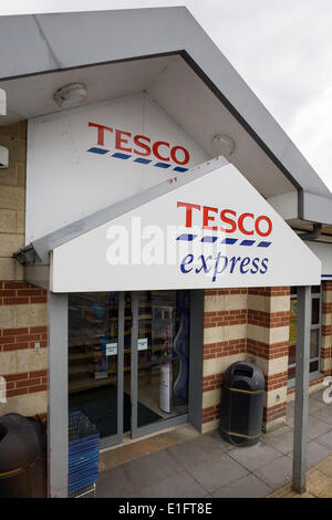 CHIPPENHAM, UK, 3rd June, 2014. A Tesco Express store entrance is ...
