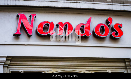 Nando's Peri Peri Chicken restaurant sign with funny caption "man ...