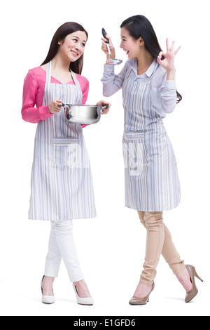 Best female friends doing taste test Stock Photo - Alamy