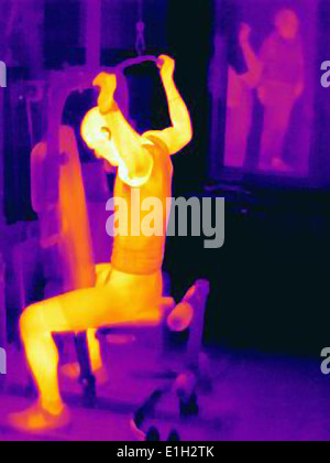 Young man with orange on white stock photo Stock Photo - Alamy