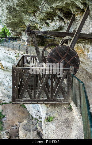 Medieval cranes and winches at the fortified troglodyte town La Roque ...