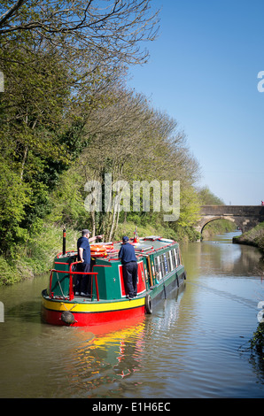 Colourful bright green narrow boat on The Regents Canal at Lisson Grove ...