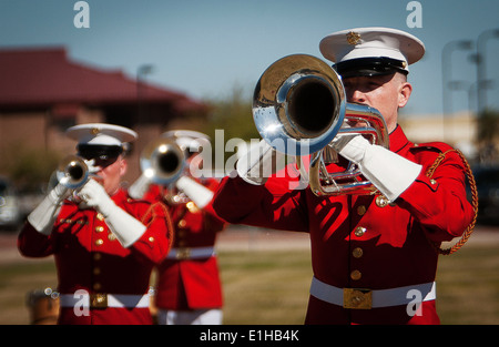 A US Marine Drum & Bugle Corps bugler plays taps during a Stock Photo ...