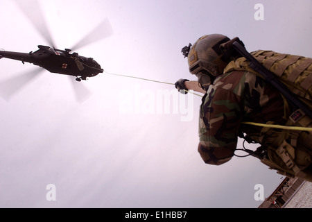 An Afghan National Army (ANA) commando with the 6th Special Operations ...