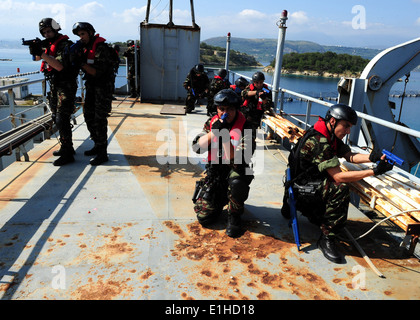 US Navy Moroccan Maritime Interdiction Operational Team descend into a ...