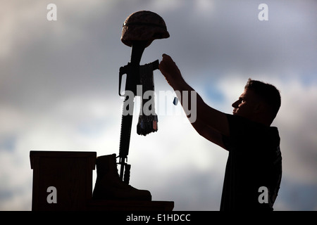 A US Marine Corps scout sniper with 1st Marine Division prepares an ...