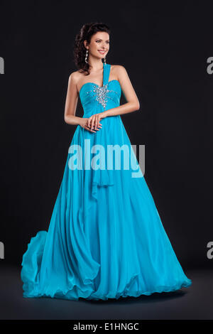 Beautiful black woman standing over blue background doing time out ...