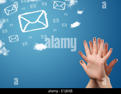 Happy smiley fingers looking at mail icons made out of clouds Stock ...