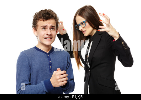 Studio shot of angry menacing teacher teacher threating student ...