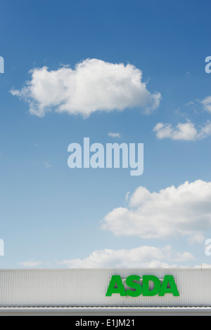 ASDA sign on superstore with blue cloudy sky Stock Photo - Alamy