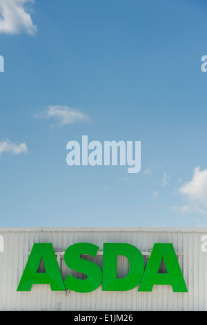 ASDA sign on superstore with blue cloudy sky Stock Photo - Alamy