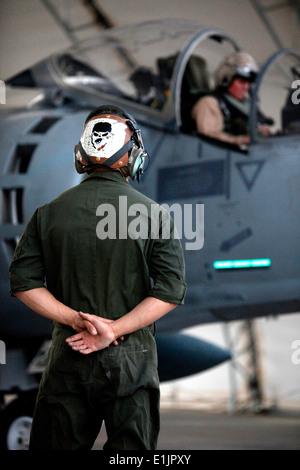 U.S. Marine Corps Col. Scott E. Conway, center, commanding officer ...