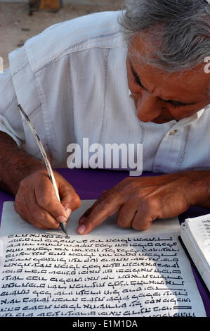 Torah scribe copying the Torah Stock Photo - Alamy