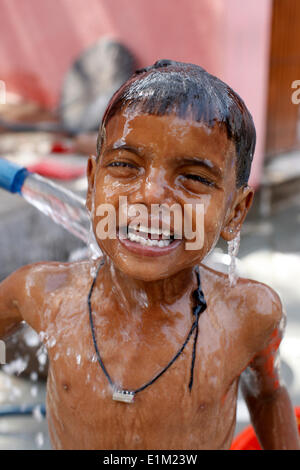 Boy having a wash Stock Photo - Alamy