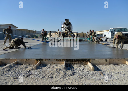 U.S. Airmen, assigned to the 577th Expeditionary Prime BEEF Squadron ...