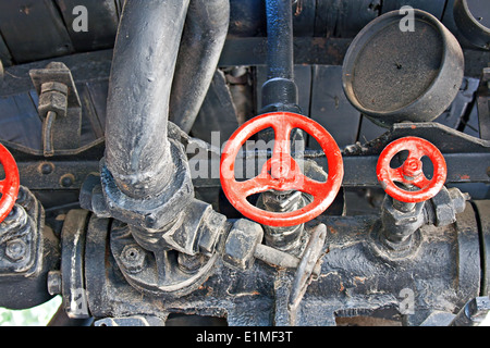 a steam locomotive engine room with the boiler and valves Stock Photo ...