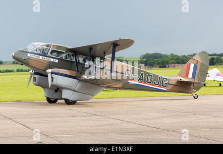 De Haviland Dragon Rapide 1930s passenger airplane G-AGJG in camouflage ...