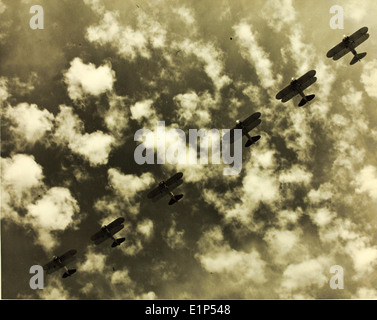 This photo shows a historic flight formation, where aircraft are ...