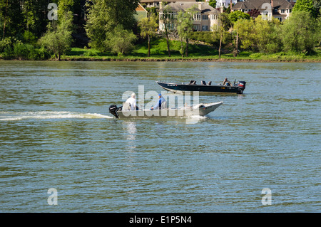 Fishermen and fishing boats on the Willamette River. Portland Oregon ...