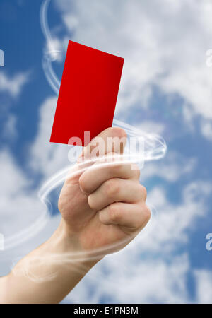 Hand holding up red card Stock Photo - Alamy