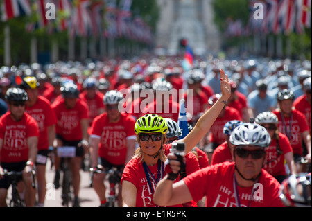 Hero Ride 2014 with riders in fancy dress hats in Whitehall, central ...