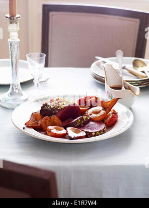 Fillet of doe with roasted fruit Stock Photo - Alamy