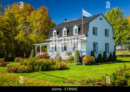 A rural Quebec home in the countryside with fall foliage color, Quebec ...